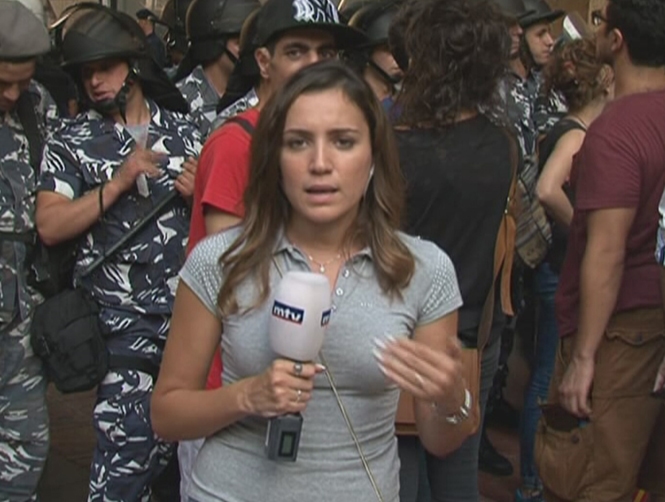 MTV Correspondent reporting from Mar Mikhael: Protesters, marching ...