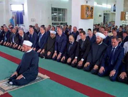 Syria's Assad performs Eid al-Adha prayers at Bilal Mosque in the city ...