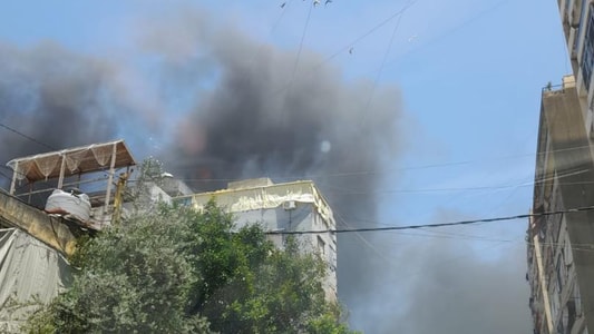 Photo: A fire broke out in Qasqas area in Beirut, and thick smoke rose ...
